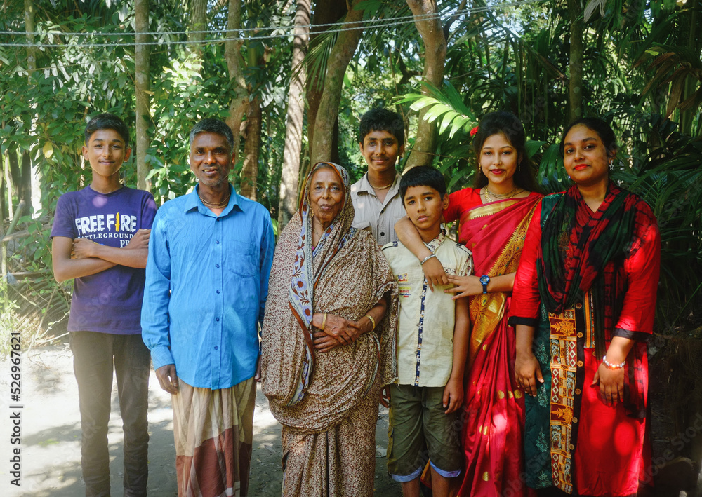 A group photo of Bangladeshi combined family consists of many generations, hindu religious ...