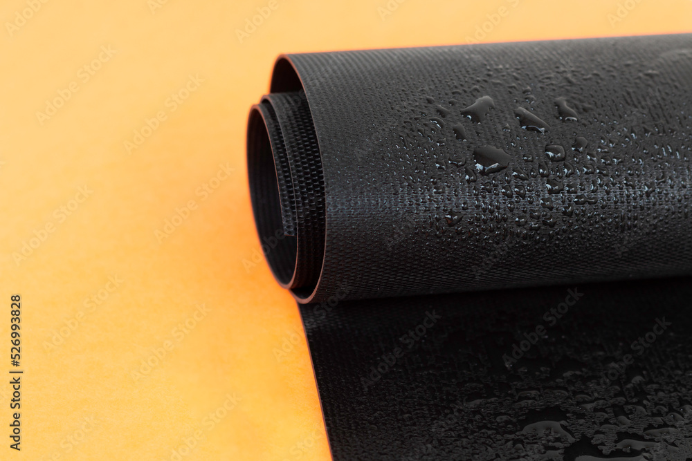 Water droplets on the rubber membrane. Waterproofing... Close-up ...