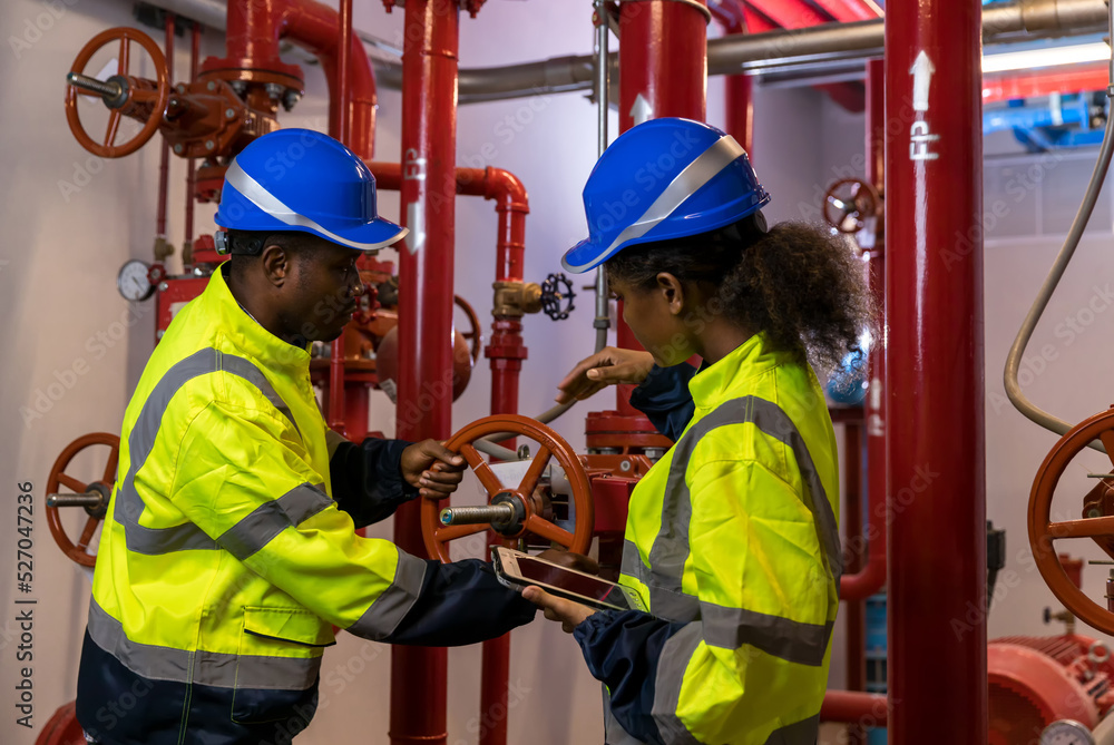 Engineer or technician work checking Fire suppression system and fire ...