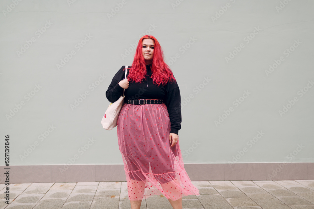 Foto de Plus size overweight fat body positive lgbtq woman with red ...