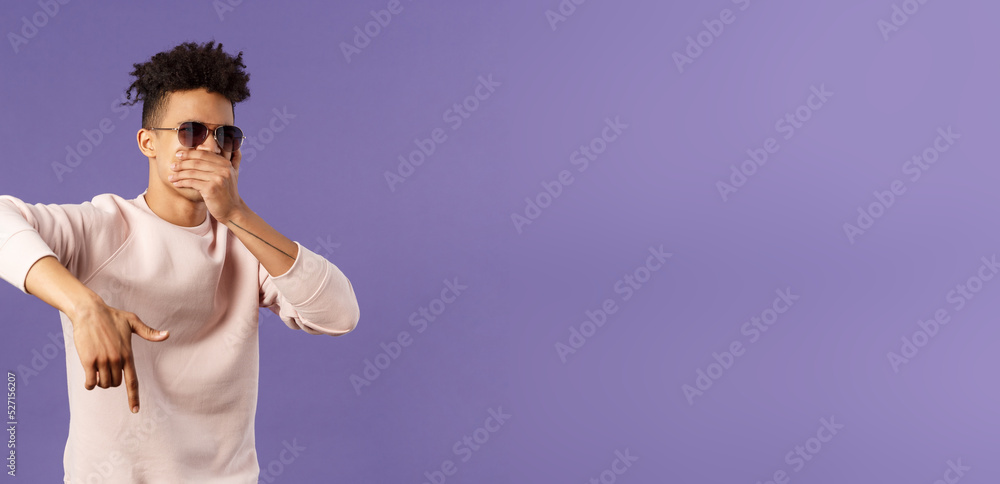 Waist-up portrait of cool young handsome guy with dreads, sunglasses on ...