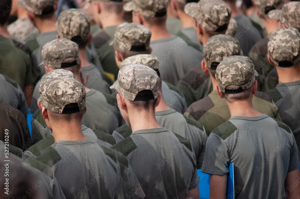 Group of men are soldiers in military uniform. Soldiers at the Military ...
