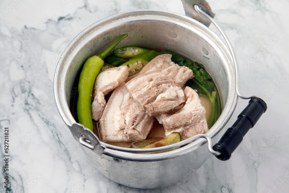 Freshly cooked Filipino food called Sinigang na liempo Stock Photo ...