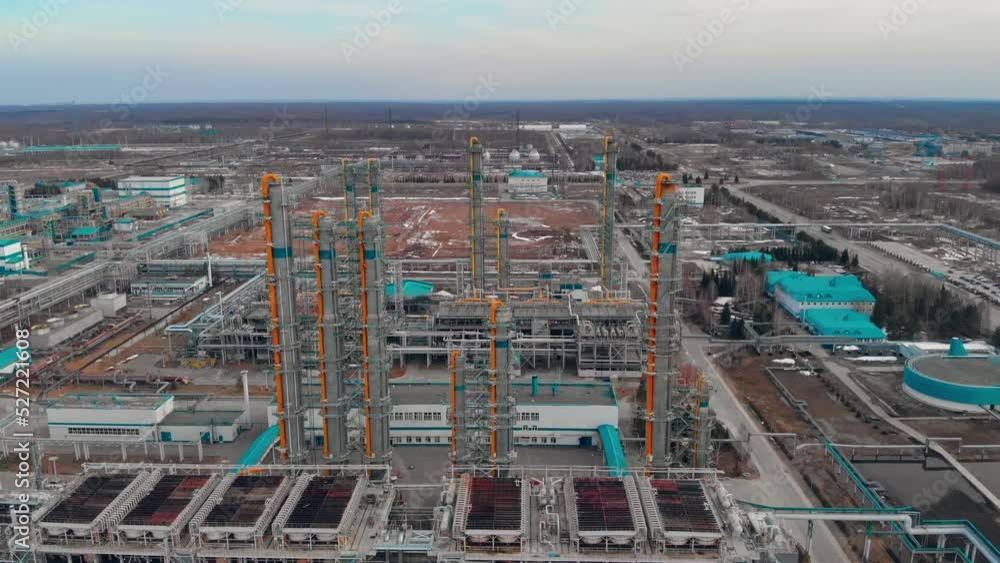 The drone flies up to the oil cracking plant, large distillation ...