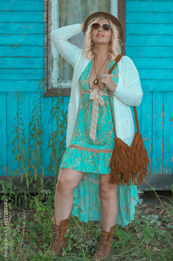 Vintage Boho style, blonde tan plus size woman in dress, wool hat and ...