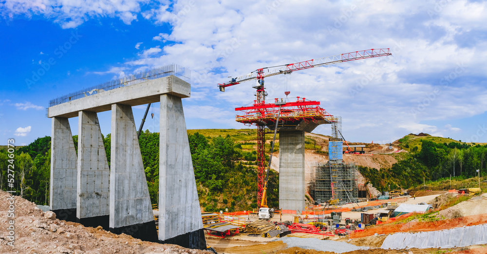 Constructing concrete pillars of the bridge. Construction of the new ...