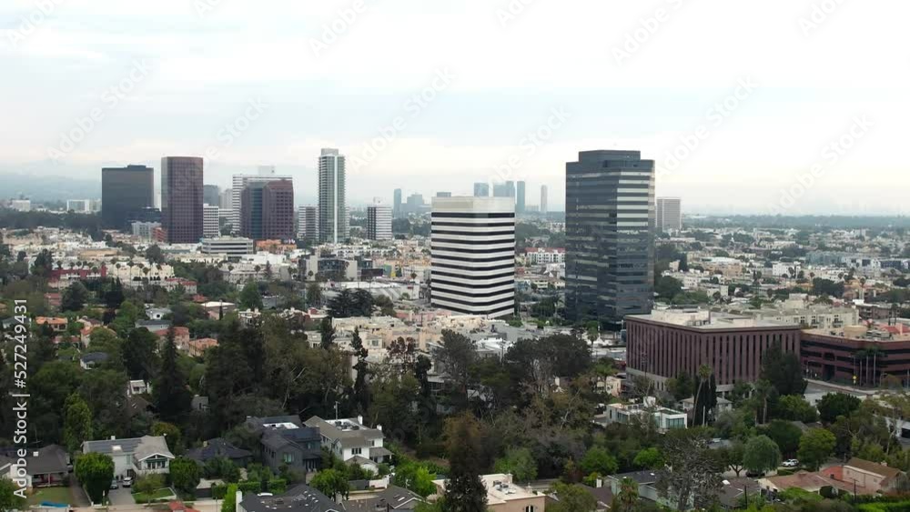 Aerial view of Brentwood California cityscape buildings rising above ...