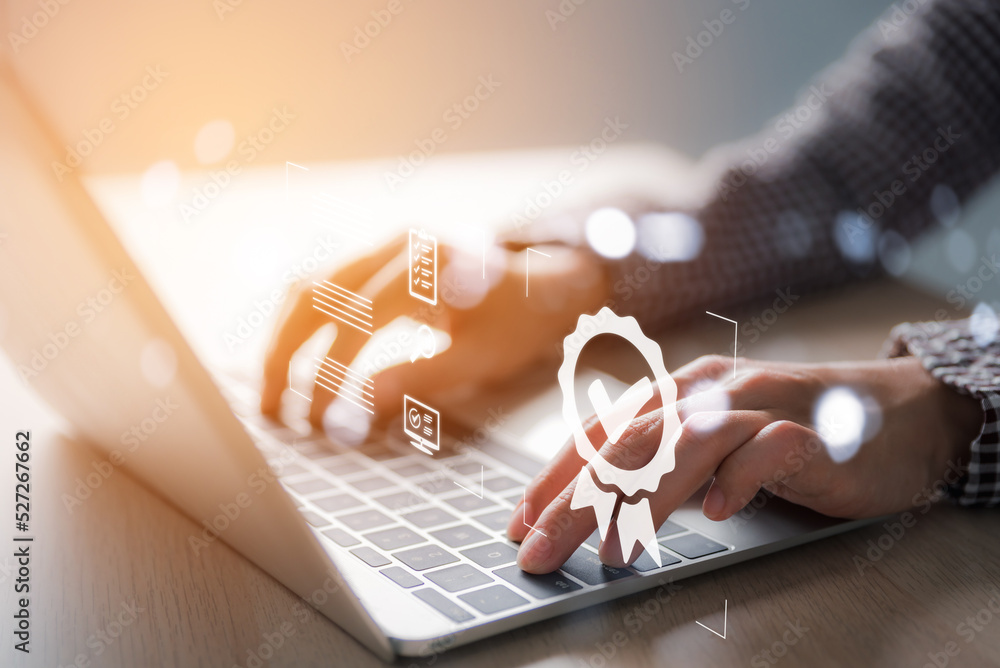 business woman's hand presses the laptop to assess customer ...