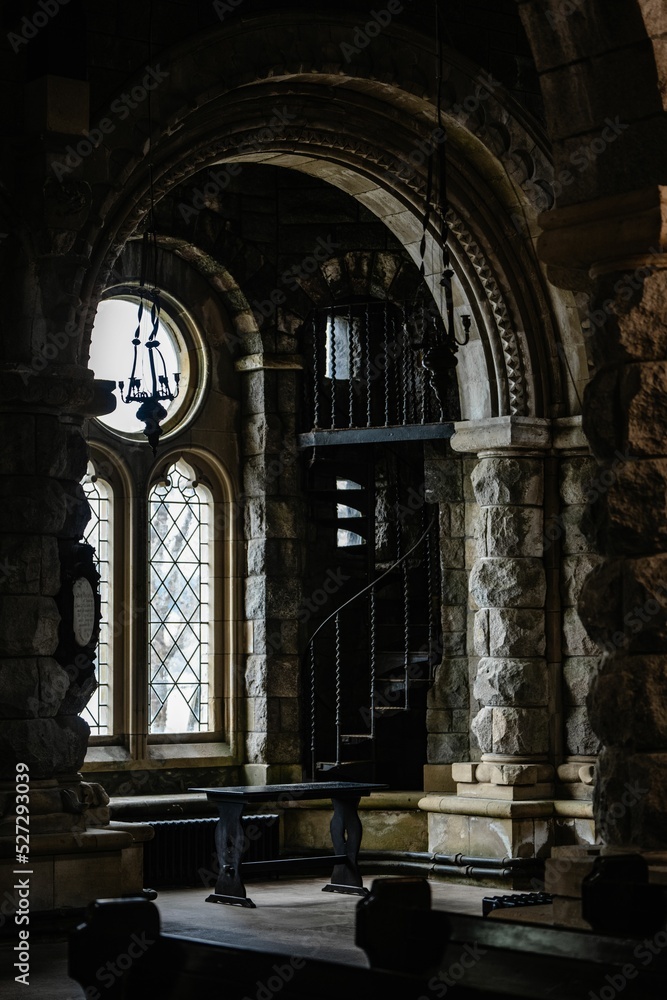 Foto de Interior of an ancient European stone cathedral with pillars ...