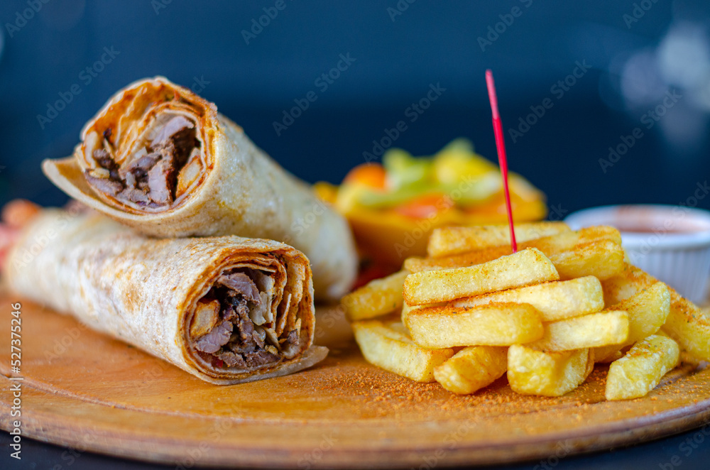 Doner kebab wrap in lavash bread. Traditional Turkish cuisine doner ...