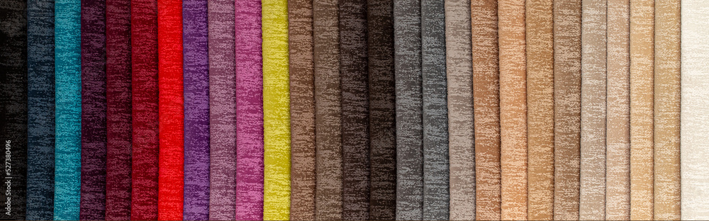 Fabric swatches in different colors are stacked for selection. A ...
