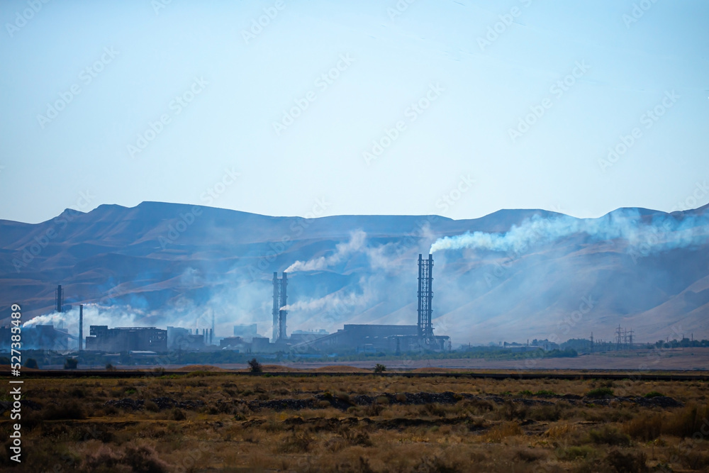 Working factory. Smoke from the factory chimney. Ecological pollution ...