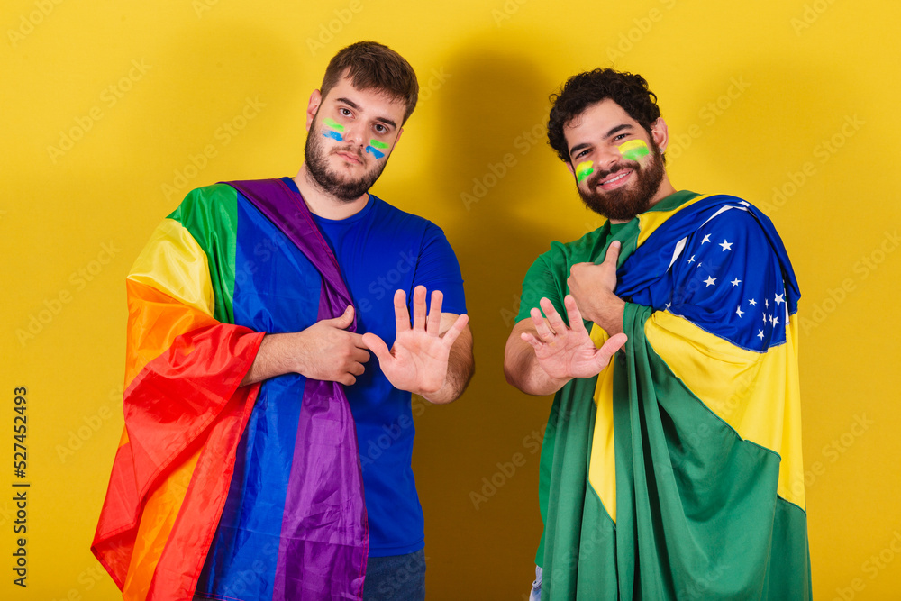 men, brazilians, soccer fans from brazil, wearing LGBT flag,.concept of ...
