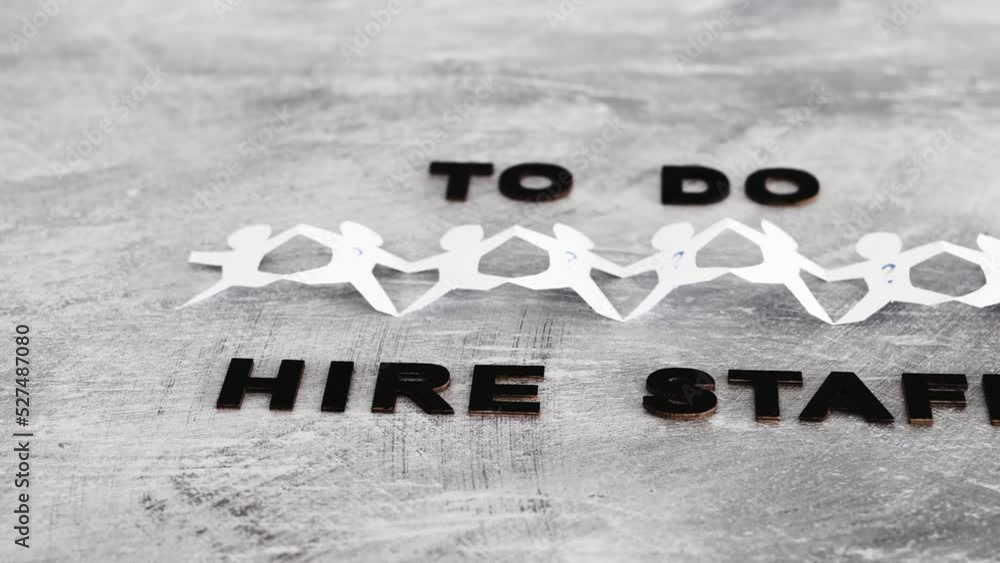 To Do Hire Staff text with paper people chain and question marks on ...