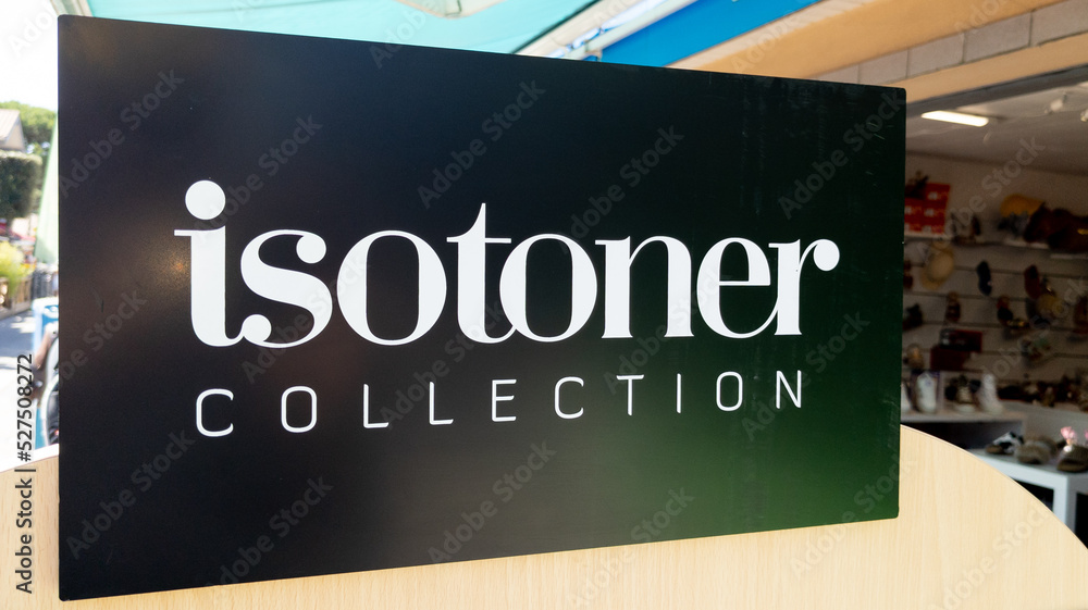 isotoner collection logo sign and brand text in store interior display ...