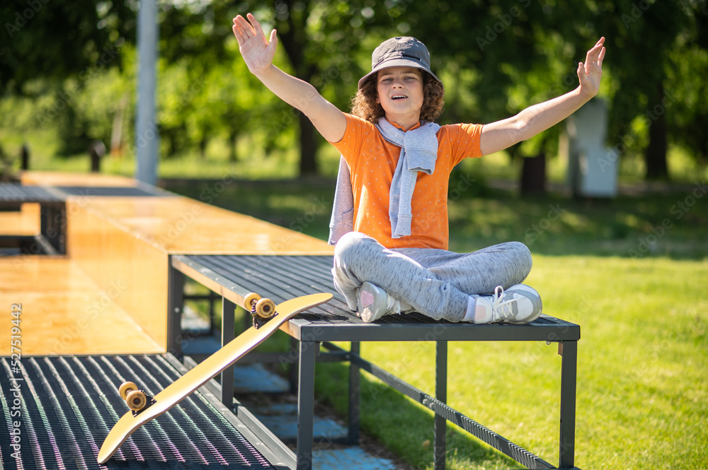 Contented adolescent posing for the camera in the lotus pose Stock ...