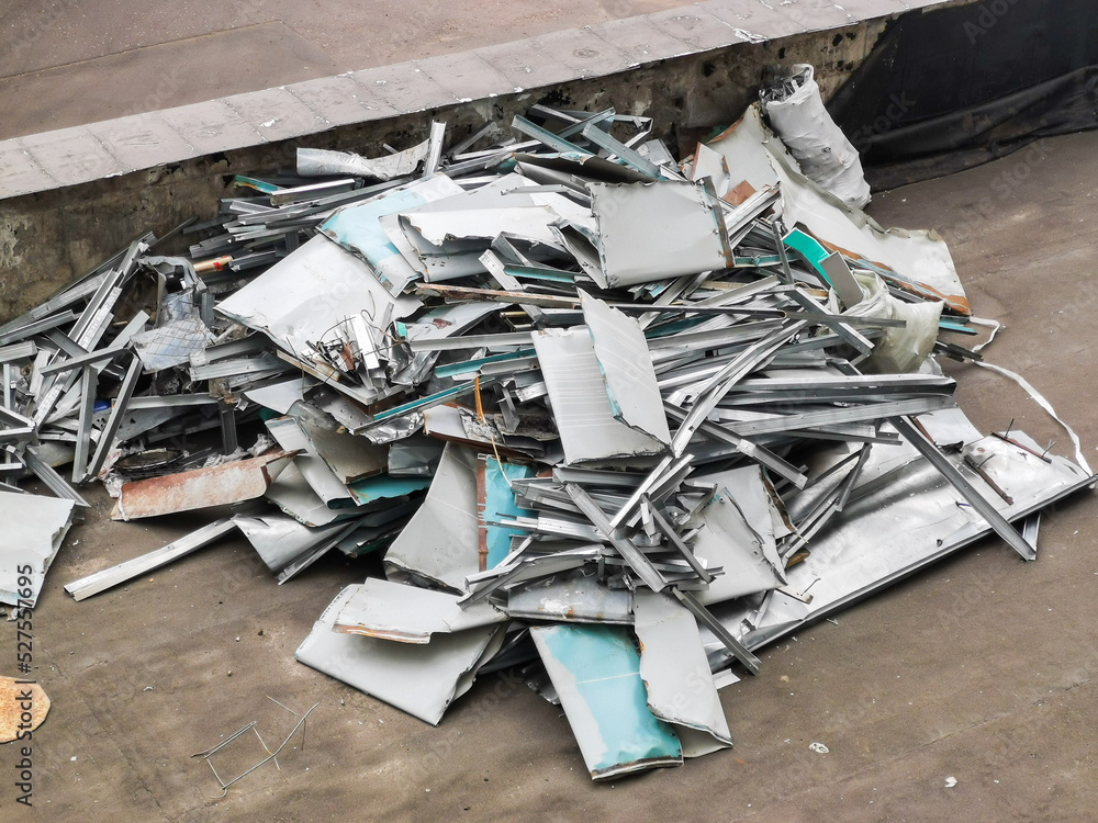 A pile of aluminum scrap. Construction debris piled up. Garbage from ...