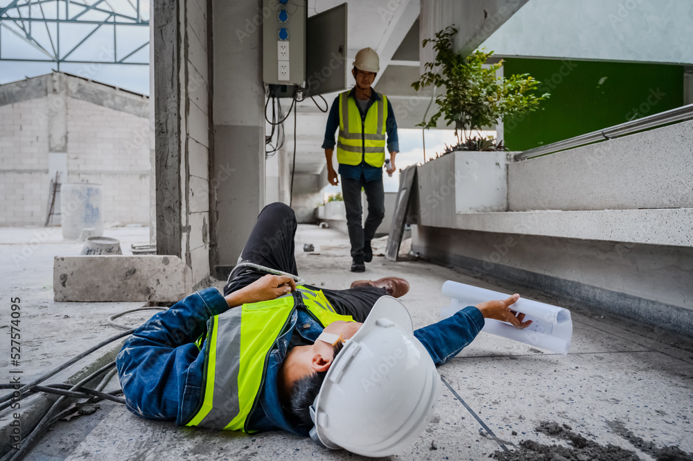 Accident at work, an Asian engineer or electrician is electrocuted to ...