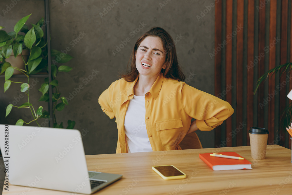 Young exhausted sad tired employee business woman she wear casual ...