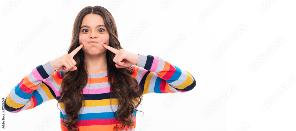 Funny face. Beautiful teen child pinching cheeks with index finger ...