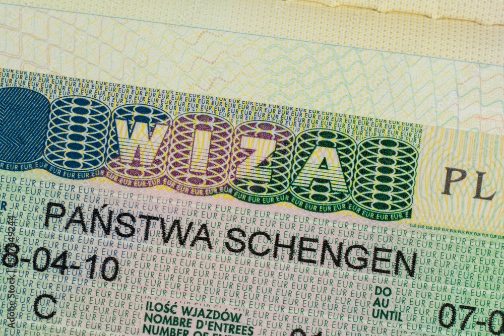 Schengen visa in the passport close-up. Polish visa. "Państwa Schengen ...