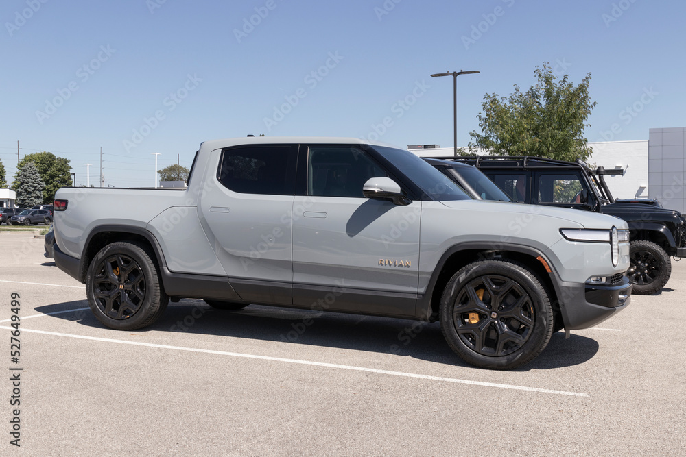 Rivian R1T Pickup Truck display at a dealership. Rivian offers the R1T ...