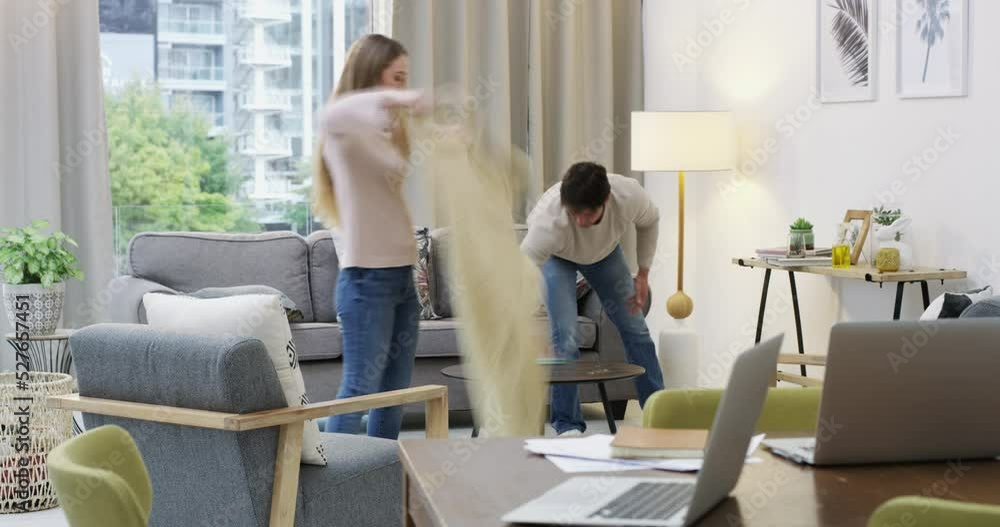 Couple spring cleaning living room, teamwork speedy organized home and ...