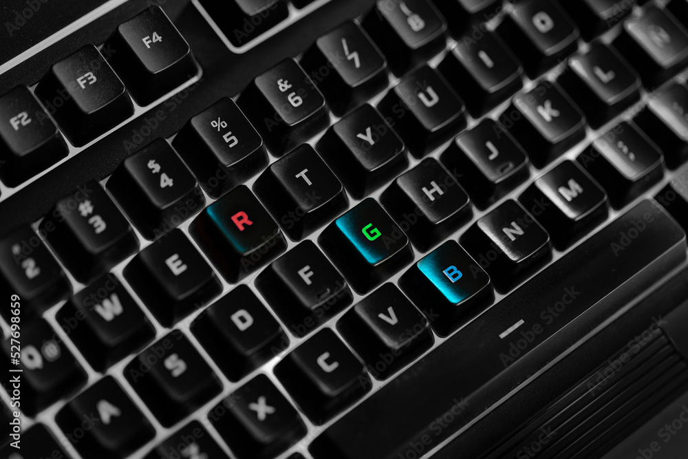 Detalle de teclado luminoso moderno RGB de colores Stock Photo | Adobe ...