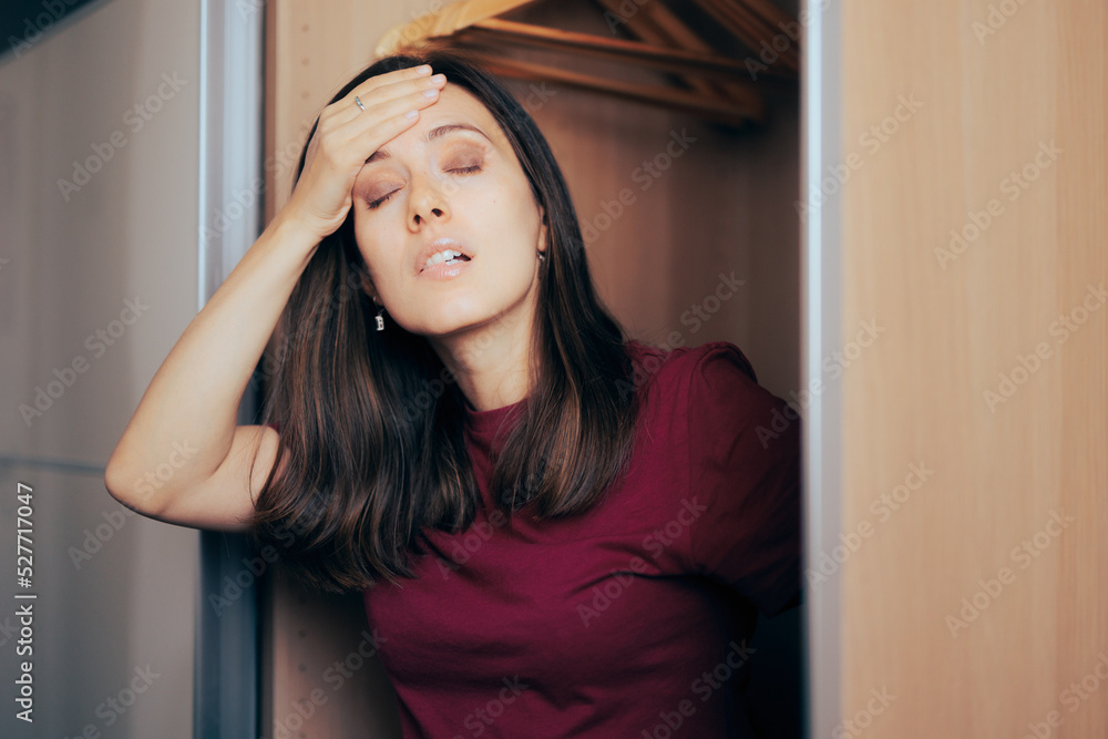 Puzzled Woman Thinking about New Clothes after Decluttering Her Closet ...