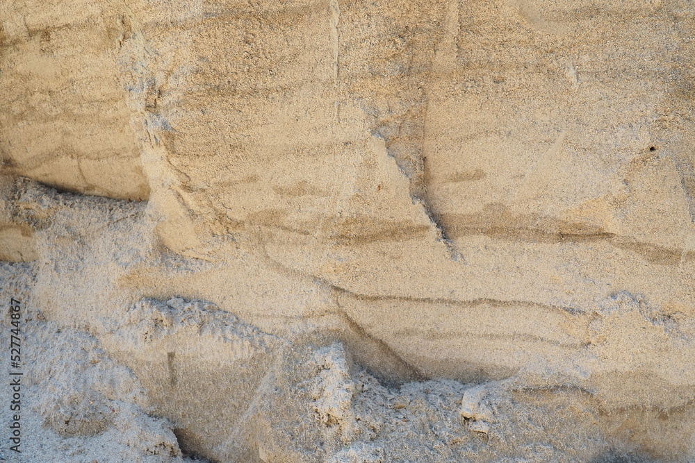 Sandstone is a fragmentary sedimentary rock, a homogeneous or layered ...