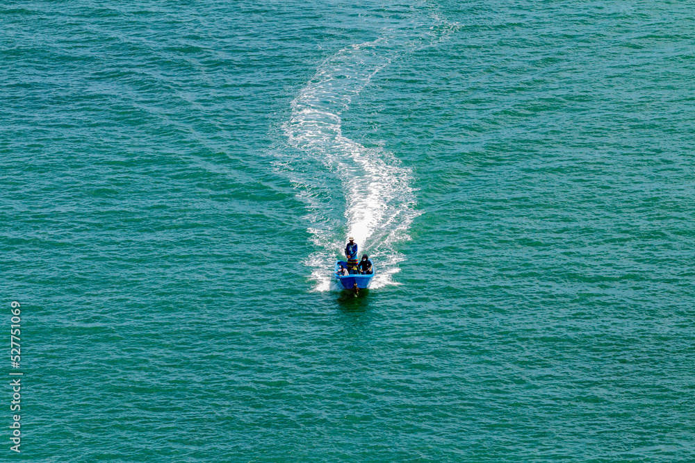 Blue speed boat in the sea near Koh Poh Island in Cambodia Stock Photo ...