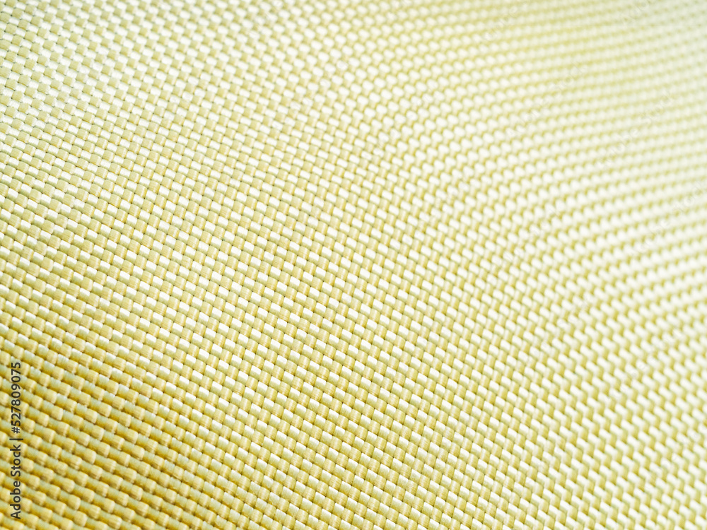 Bulletproof material aramid. Aramid kevlar background. Golden kevlar ...