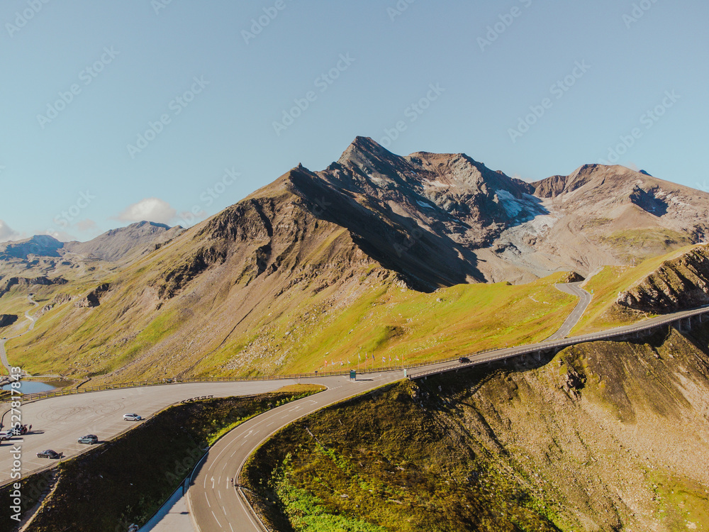 Bird's eye view of serpentine curves at sunny day. Aerial view of ...