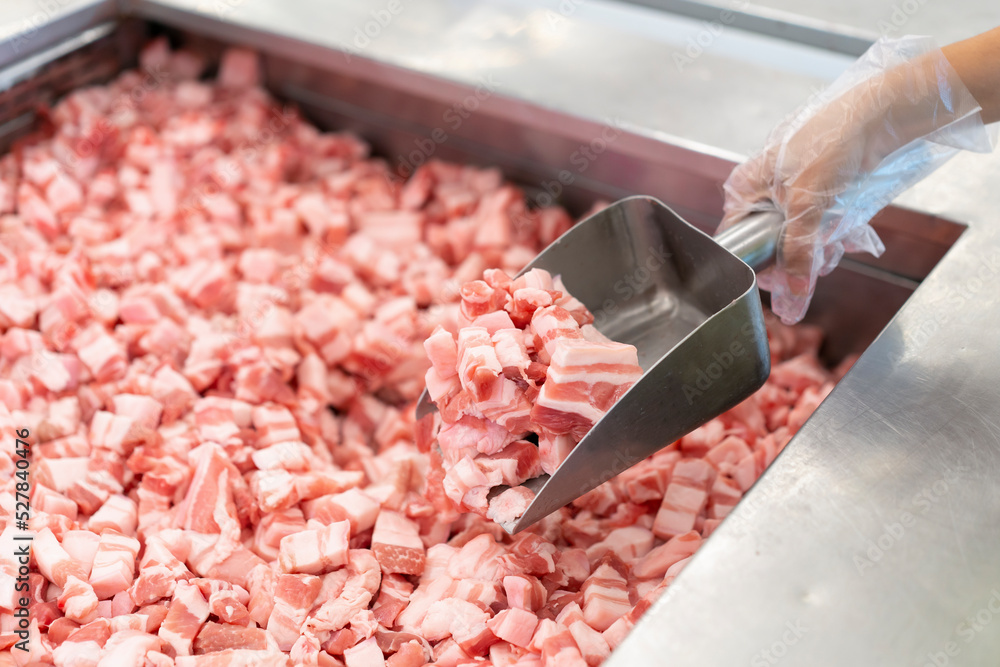 meat in supermarket. People looking some pork in supermaket for cooking ...