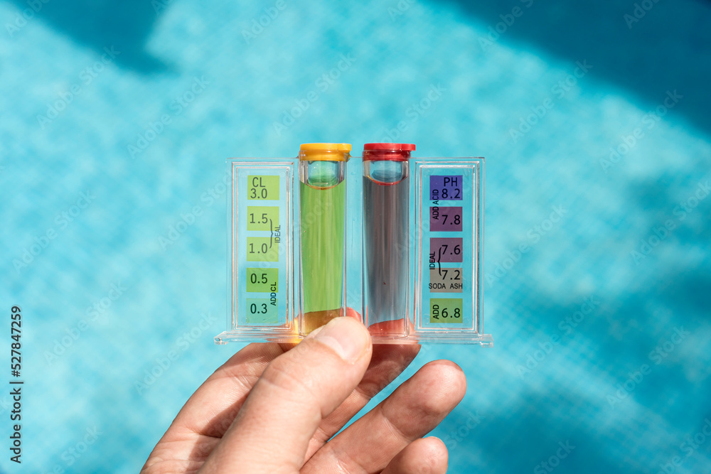 PH and chlorine analysis kit for swimming pools. Liquid chlorine and PH ...