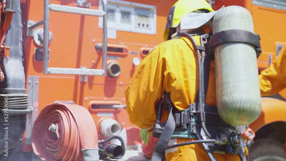 Fireman or firefighter team help to work with resemble and expand fire ...