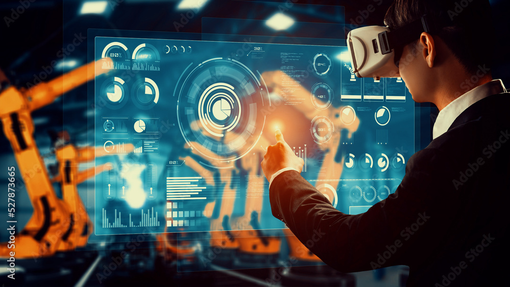 Engineer use cybernated robotic software to control industry robot arm ...