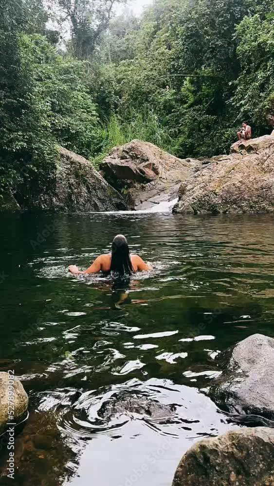 Woman taking a dip in a swimming Hole, Woman swimming, Waterfalls in ...