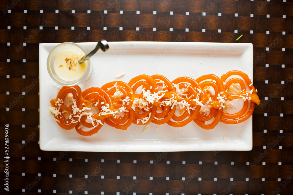 Jelabi with Rabri, jilebi, jalebi, jilapi served in a dish isolated on ...