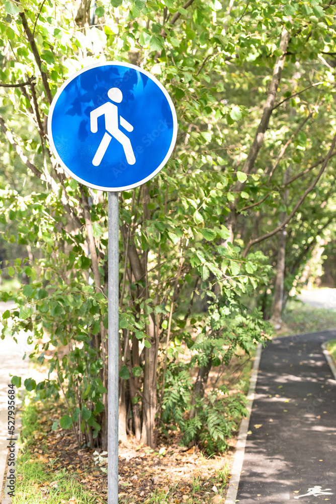 Pedestrian zone in the forest. A sign allowing only to go on foot ...