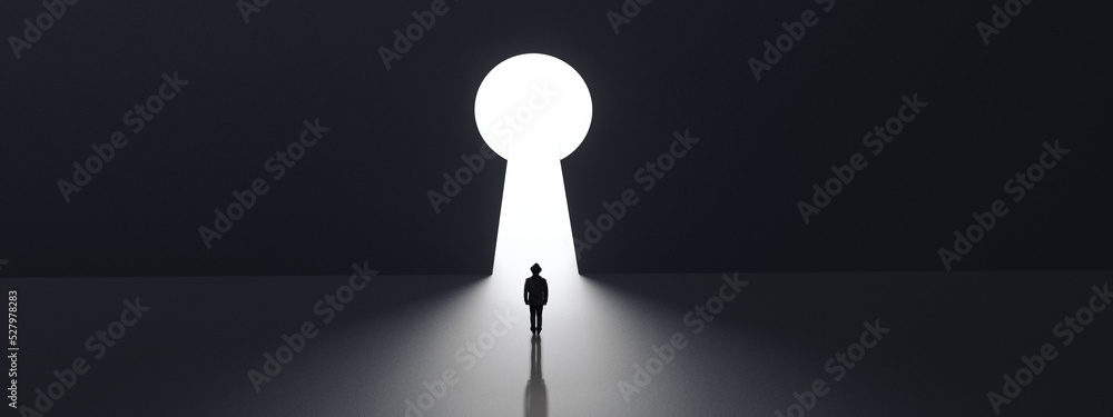 Silhouette of man against giant keyhole door. Key to everything concept ...