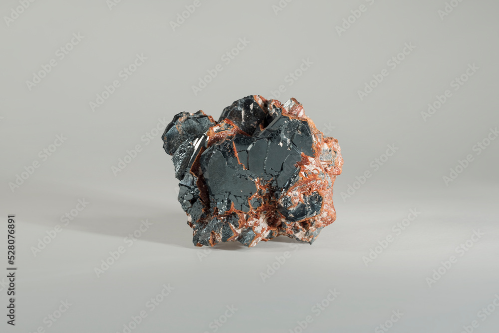 A sample of a natural mineral Hematite (oxides and hydroxides class ...