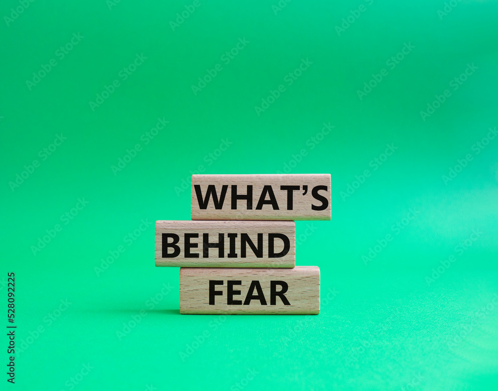 What's behind fear symbol. Concept words What's behind fear on wooden ...