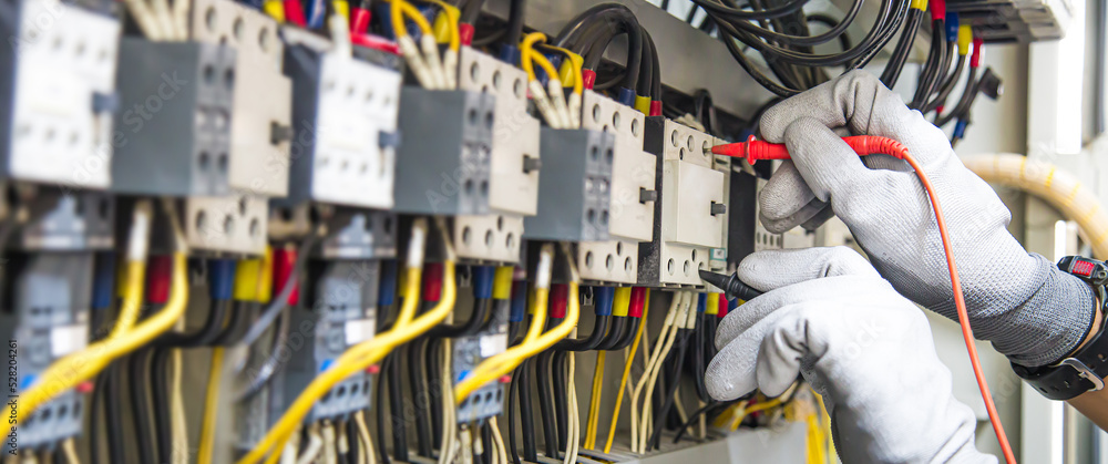 Electricity and electrical maintenance service, Engineer hand holding ...