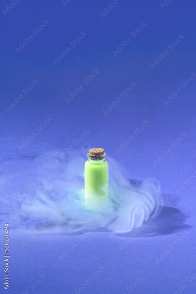 Minimal 2022 Halloween magic potion drink concept with foggy neon green ...