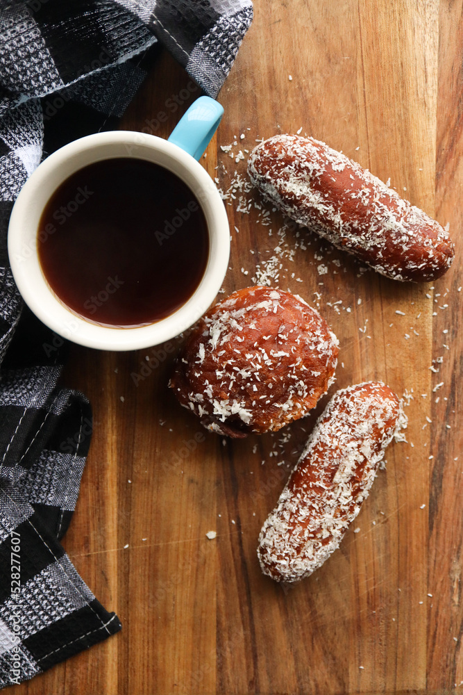Koesisters and coffee. Traditional South African sweet snack koesister ...