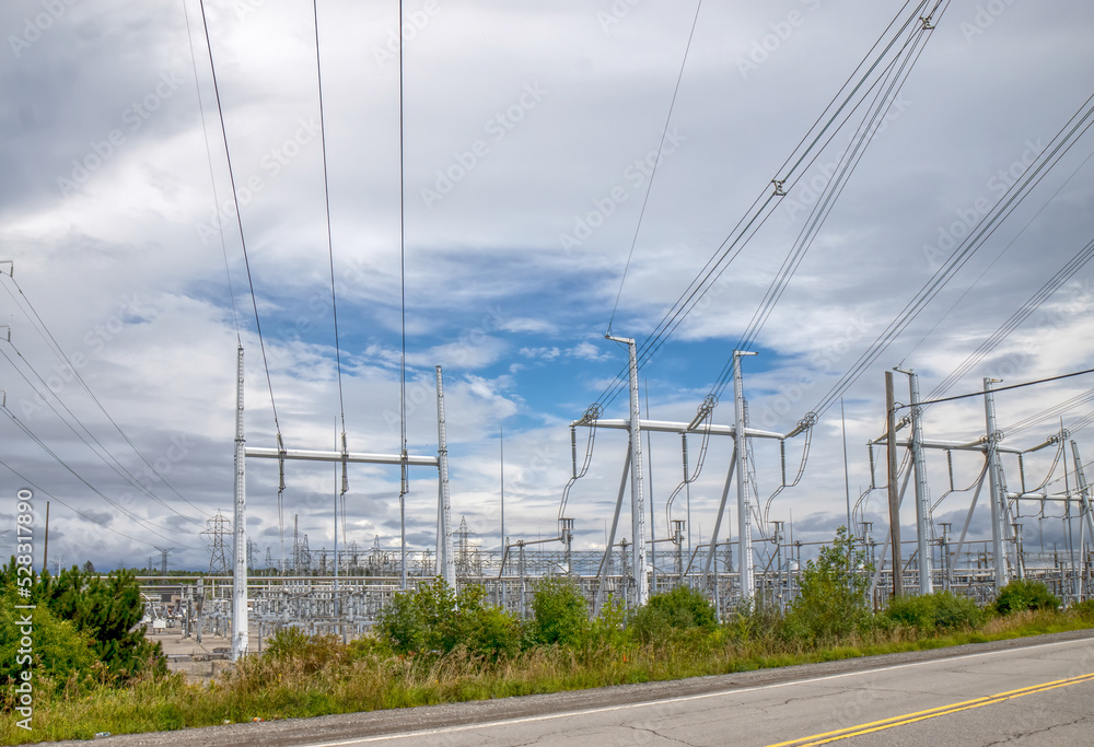 View inside of an electrical utility transformer station showing high ...
