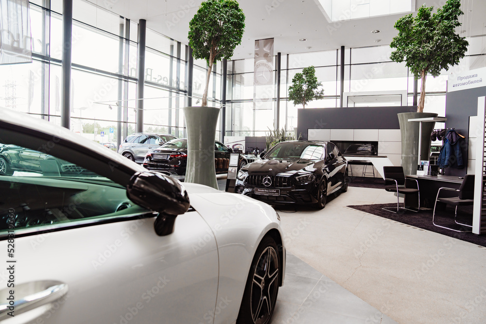 parking and interior of the Mercedes car dealership. sale of new cars ...
