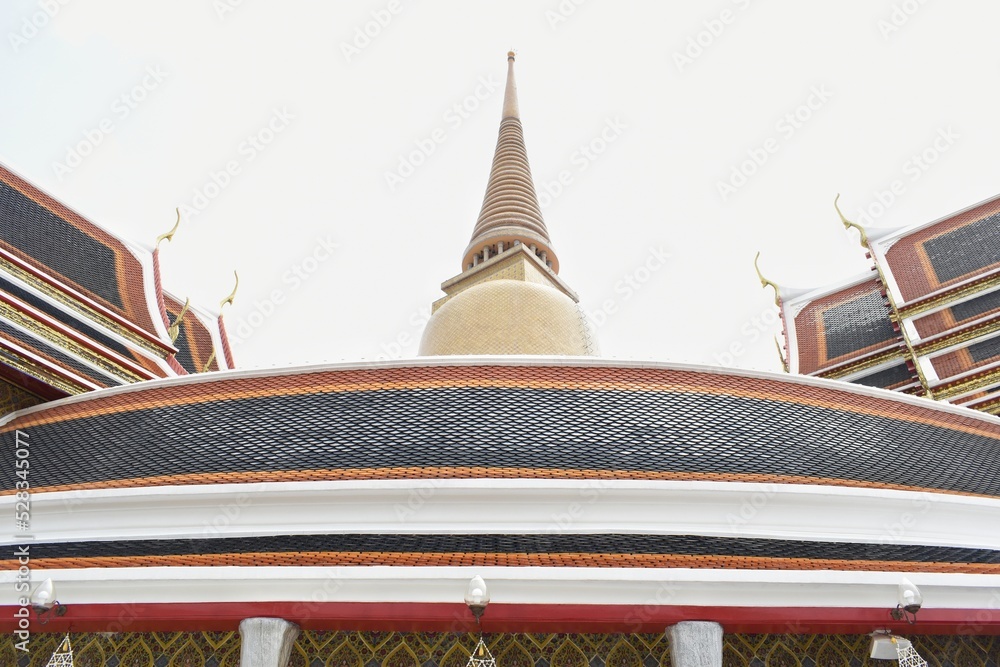 Photo & Art Print Golden pagoda and the curved walkway around the ...