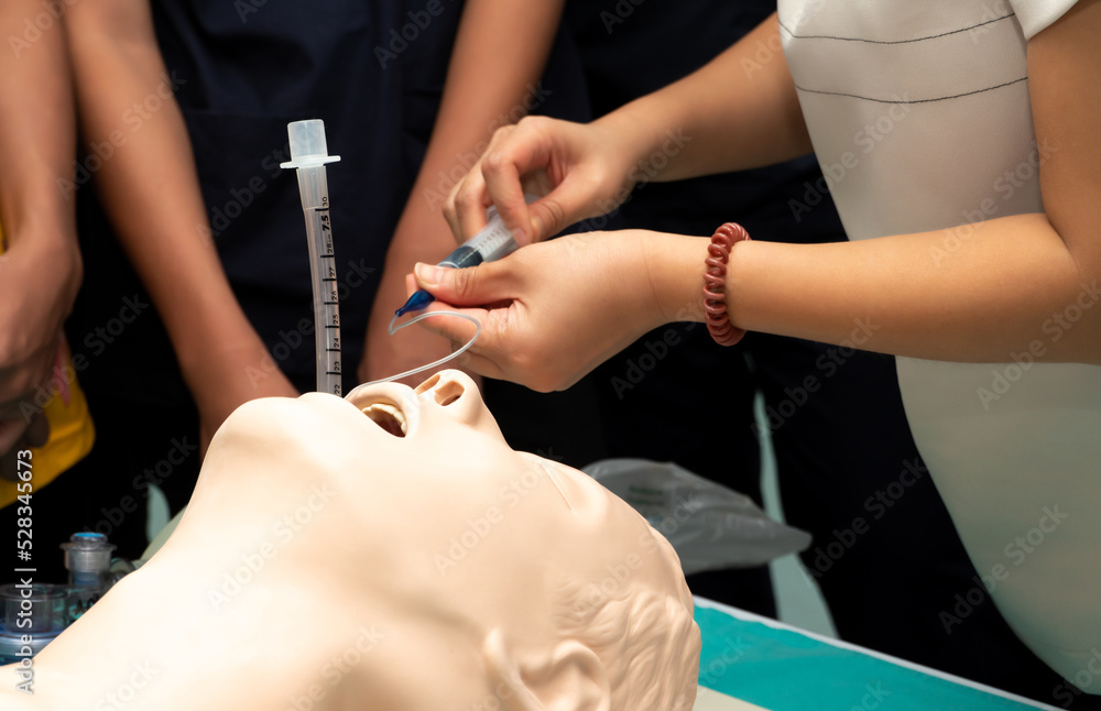 Endotracheal intubation of a reanimation training doll. mannequin dummy ...